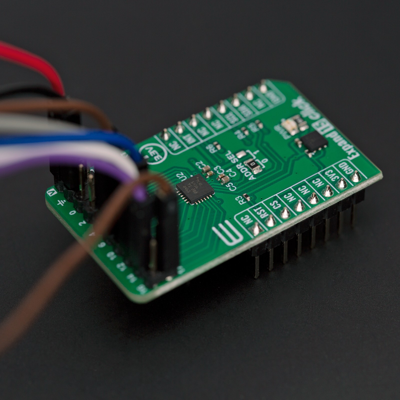 Expand 15 Click | TCAL6416 16-Bit I²C/SMBus I/O Expander