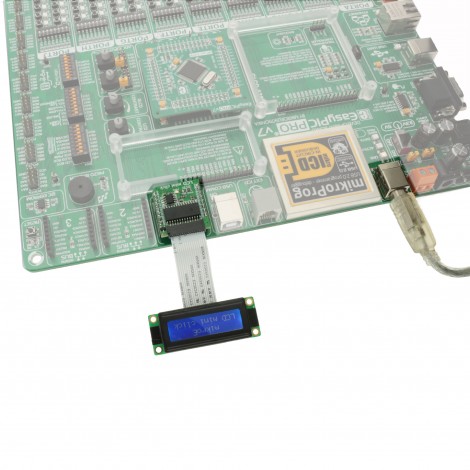 LCD mini click — displays 16x2 monochrome characters on a LCD display