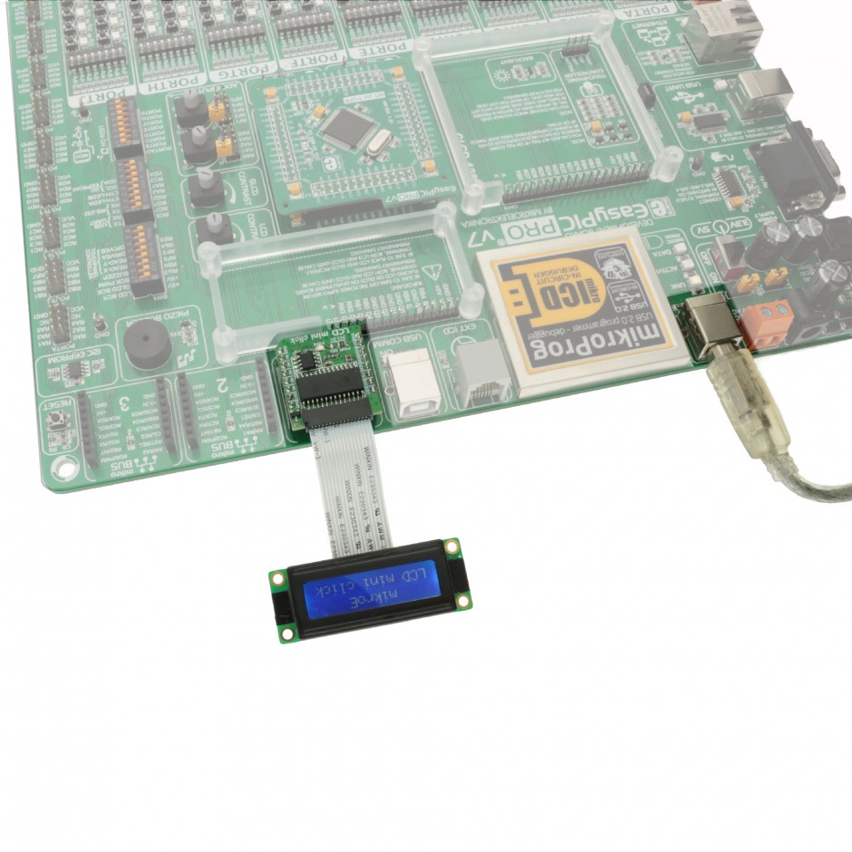 LCD mini click — displays 16x2 monochrome characters on a LCD display